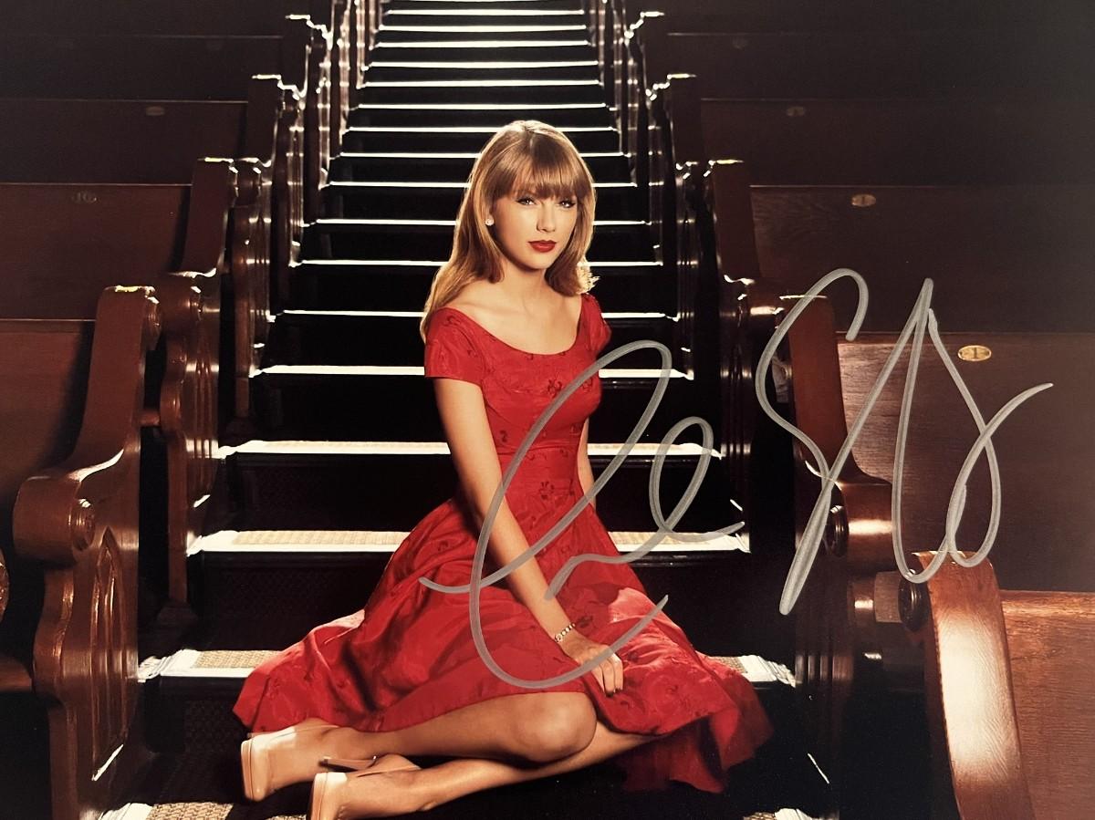 Taylor Swift signed photo | EstateSales.org