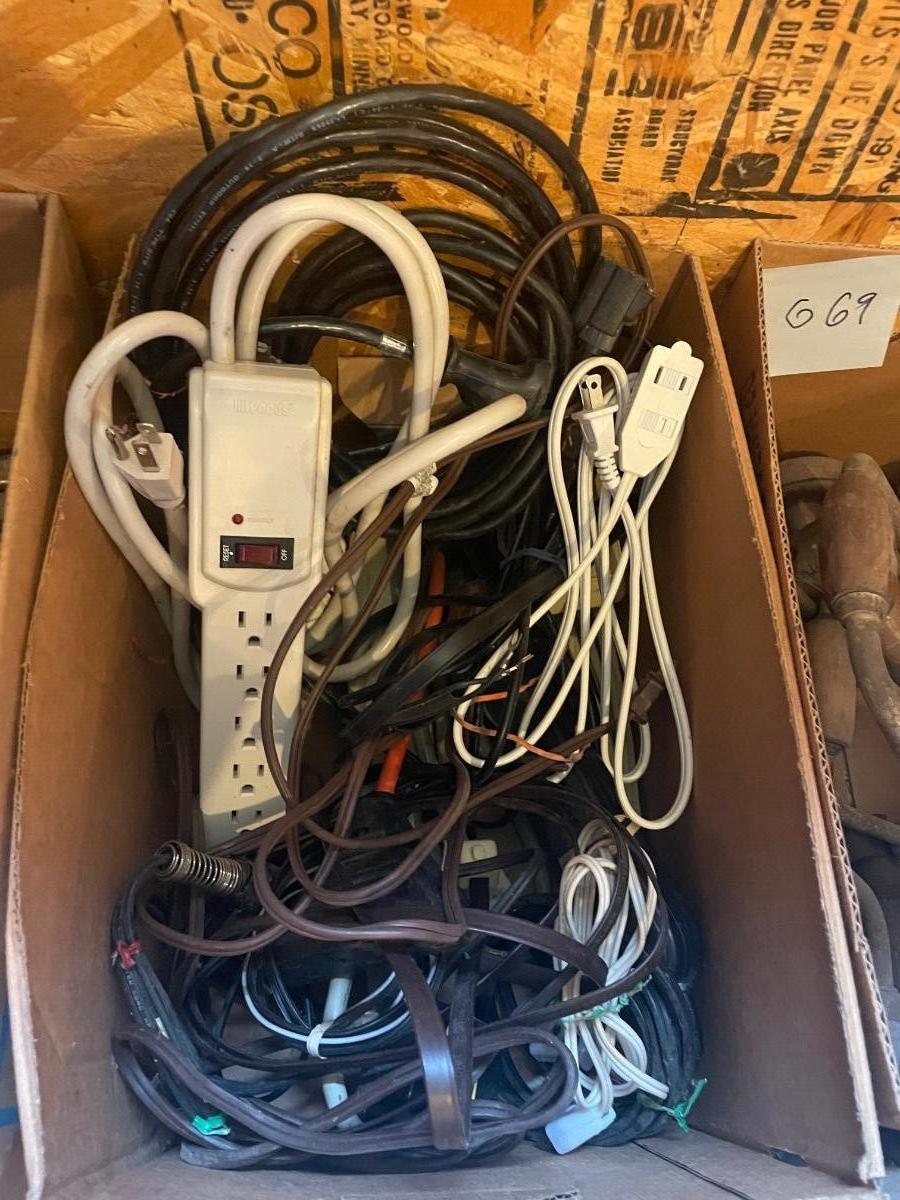 Box of cords and power strips | EstateSales.org