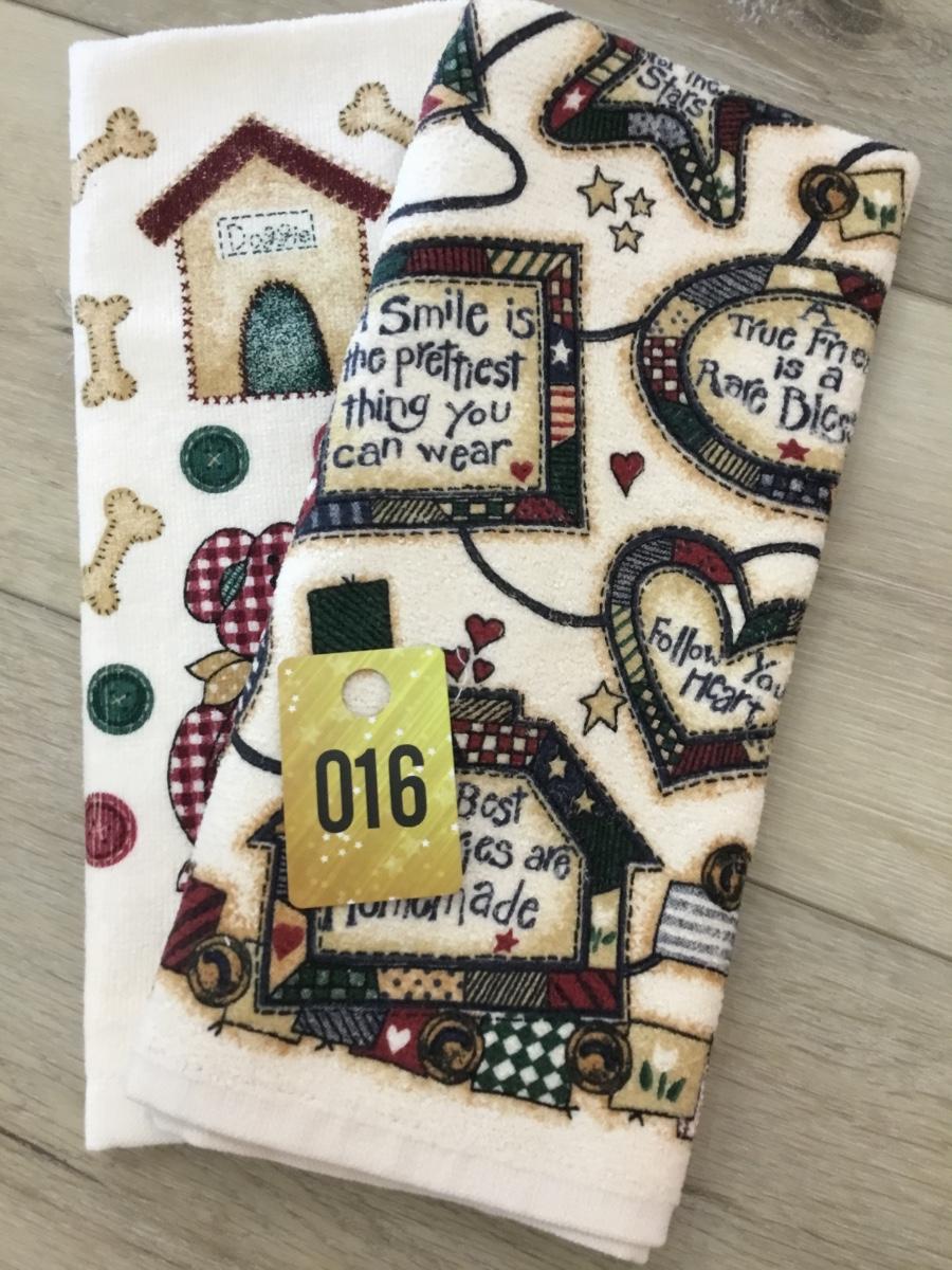Vintage new with out tags kitchen towel set | EstateSales.org