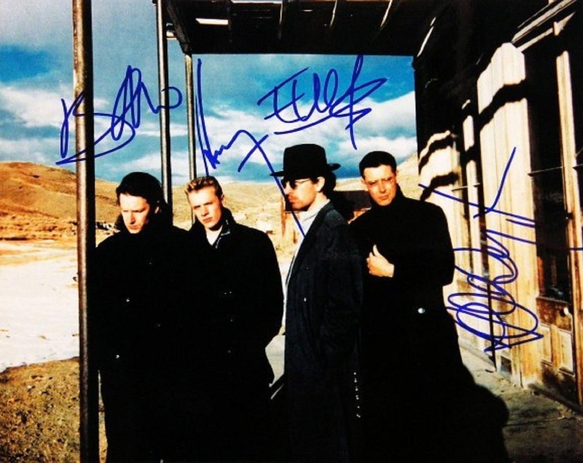 U2 signed promo photo | EstateSales.org