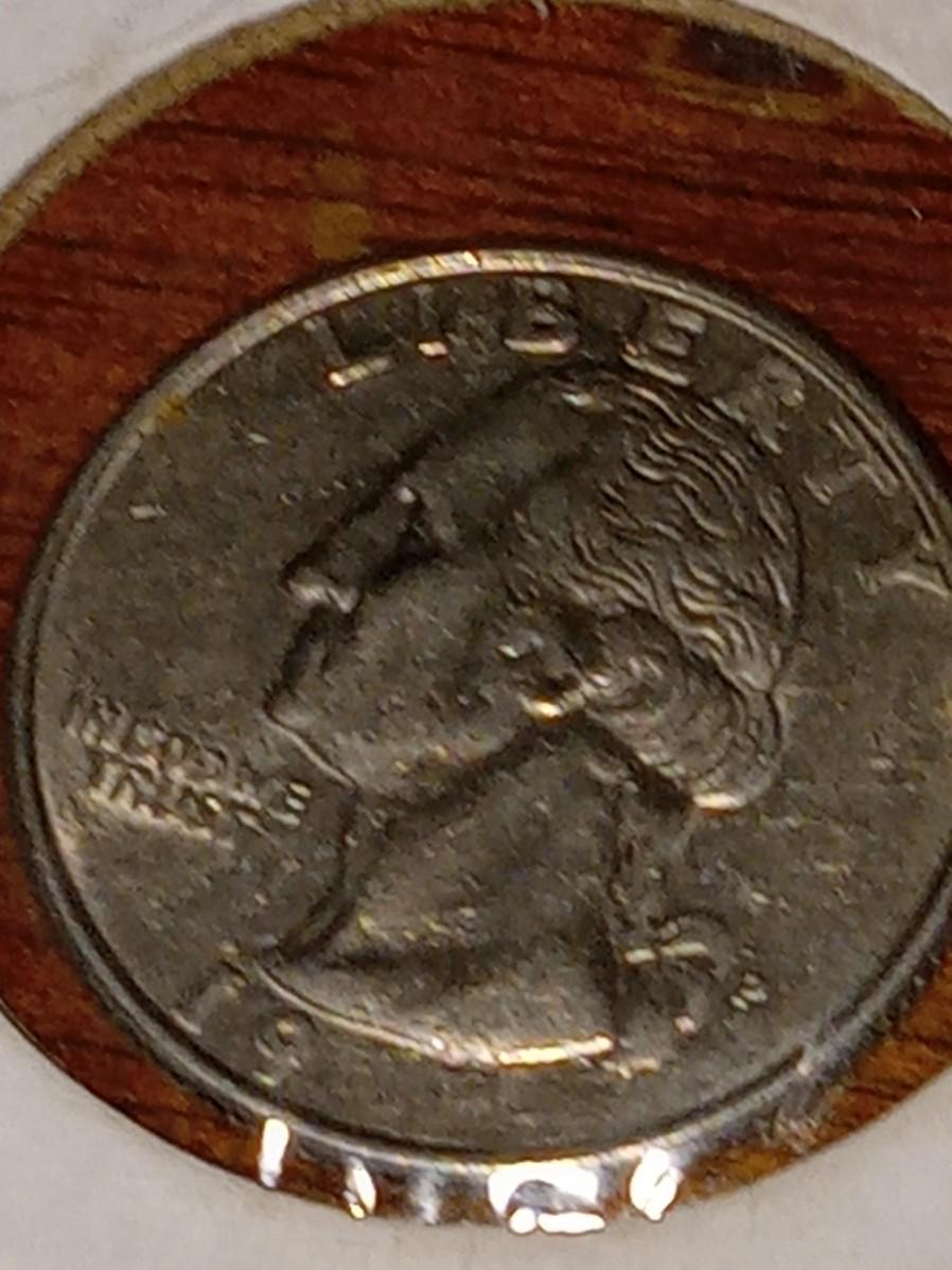 19 Something Clad Error Quarter | EstateSales.org