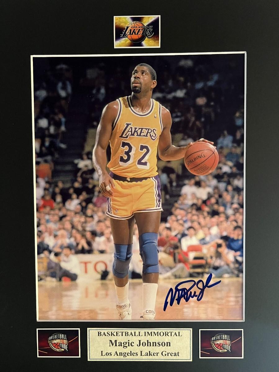 Magic Johnson signed photo | EstateSales.org