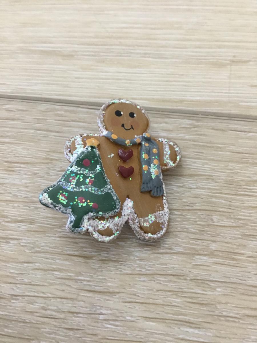 Vintage gingerbread man pin | EstateSales.org