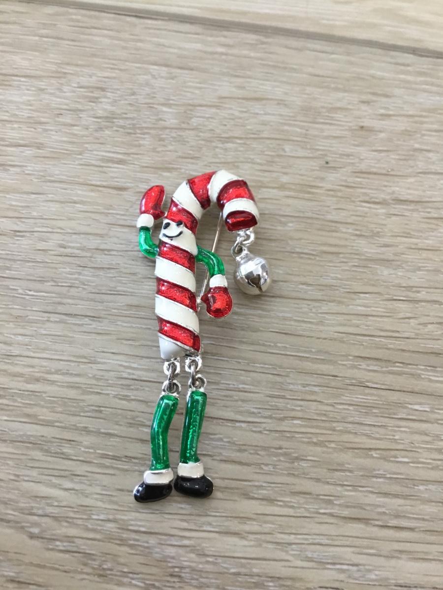 Silver tone candy cane pin | EstateSales.org