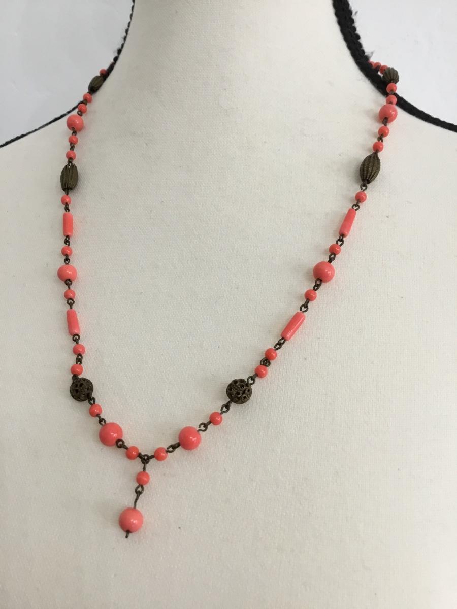 Vintage coral colored fashion necklace | EstateSales.org