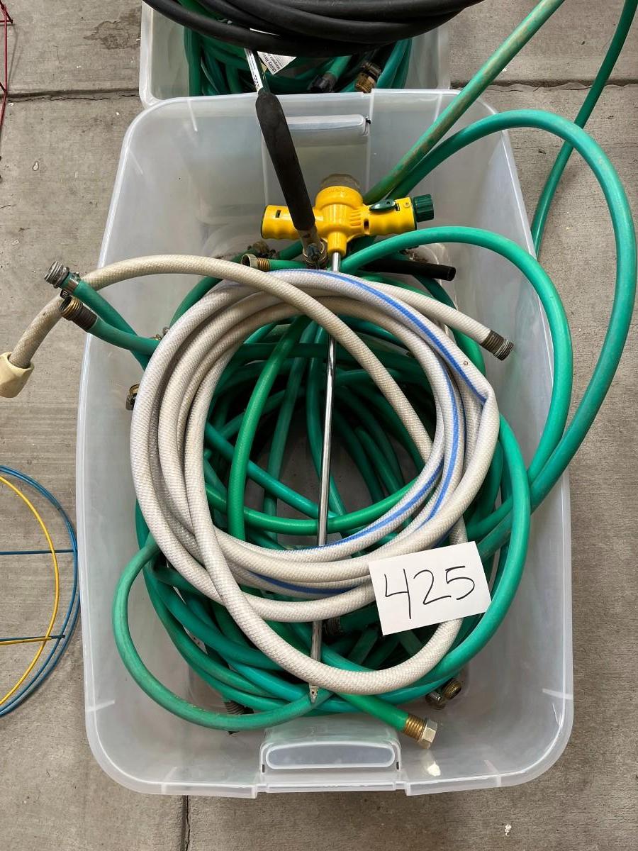 Bin W/Bundle Of Water Hoses & Sprinkler | EstateSales.org