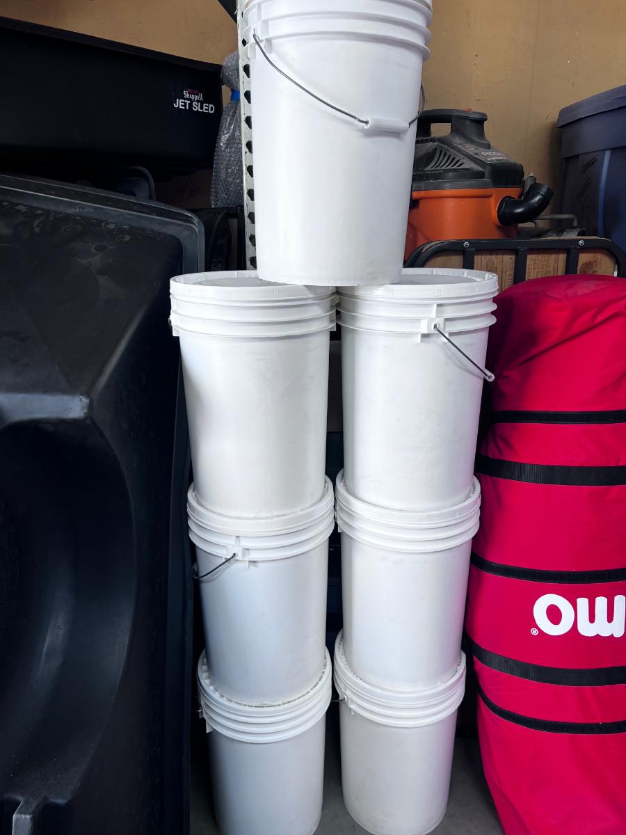 7- 45 Pound Cans of Wheat | EstateSales.org