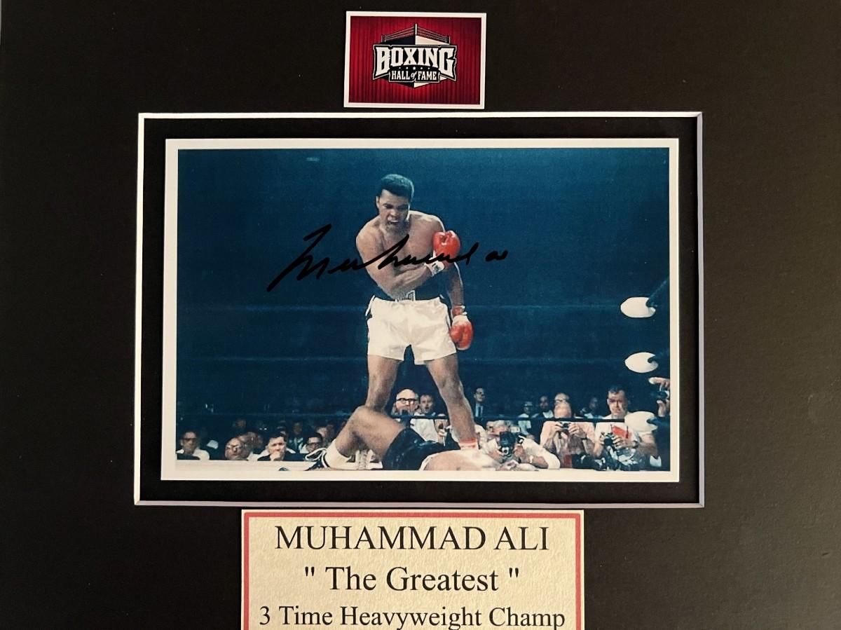 Muhammad Ali signed photo | EstateSales.org