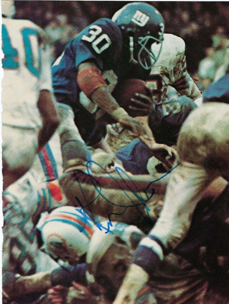 John Tuggle signed magazine photo | EstateSales.org