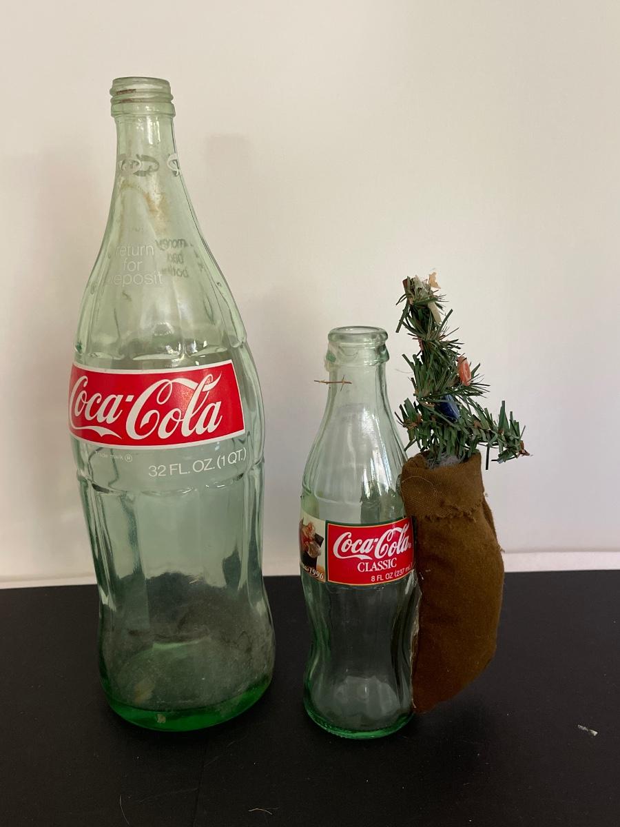 Pair of empty Coca-Cola glass bottles | EstateSales.org