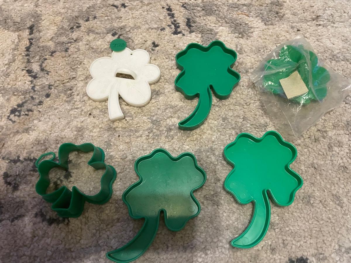 Plastic cookie cutter shamrocks | EstateSales.org