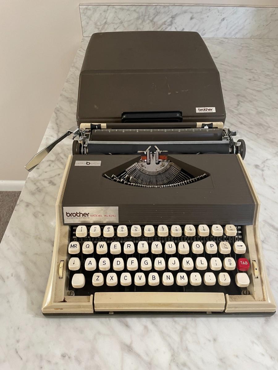 Vintage Brother Portable Typewriter with Carrying Case | EstateSales.org