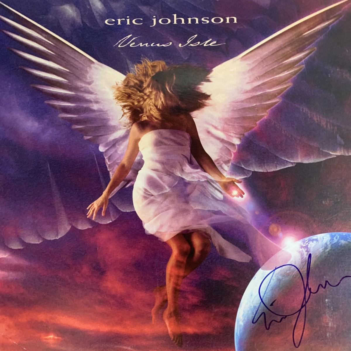 Eric Johnson Venus Isle signed album flat. GFA Authenticated ...