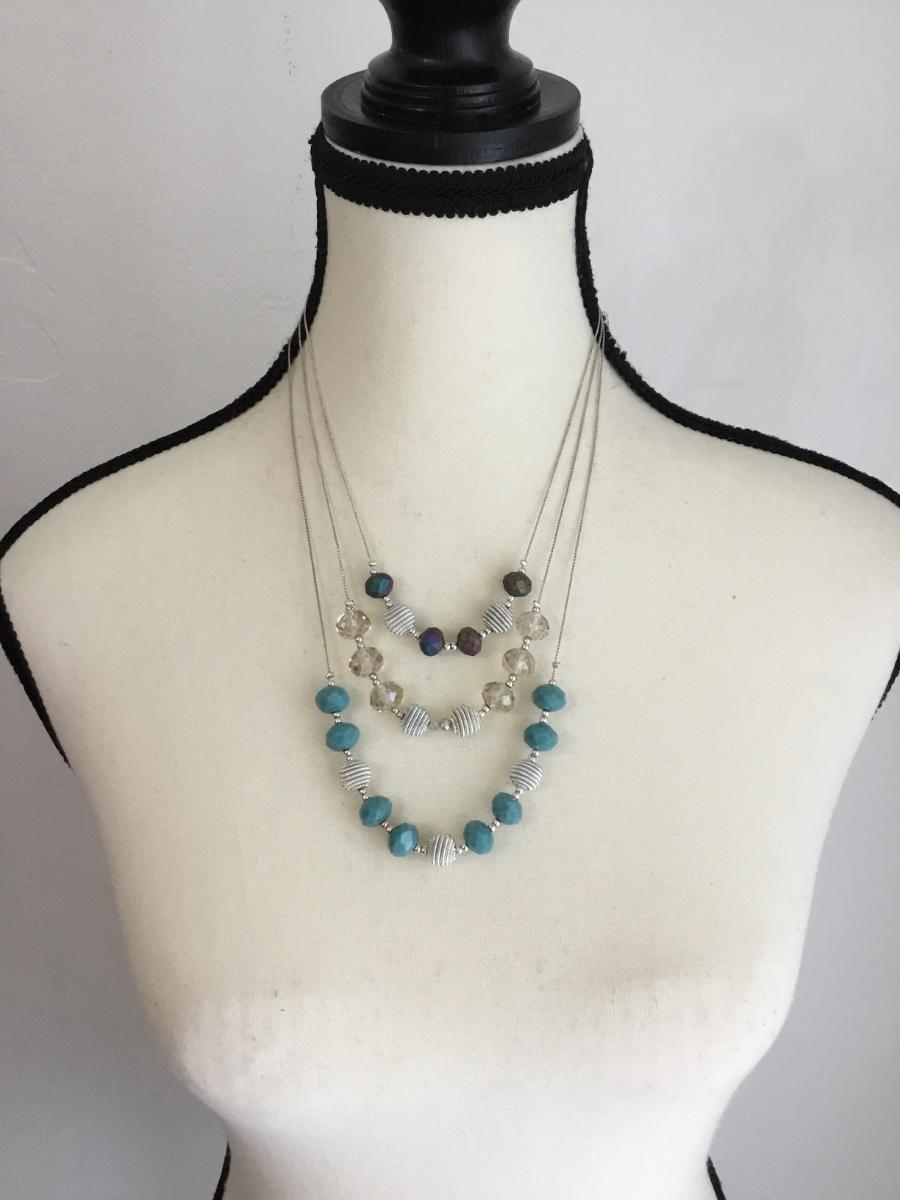 Multi layered crystal bead Silvertone statement necklace | EstateSales.org