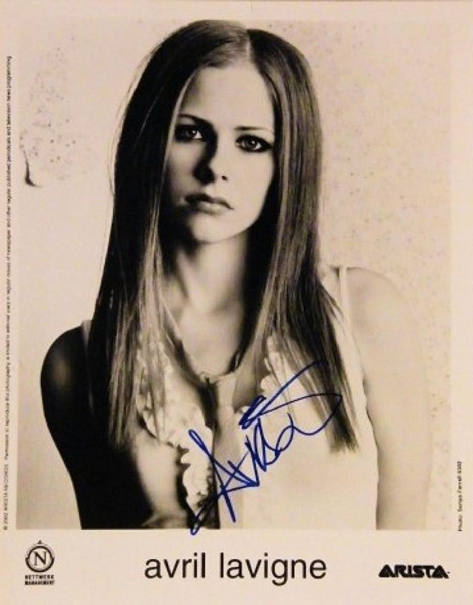 Avril Lavigne signed promo photo | EstateSales.org