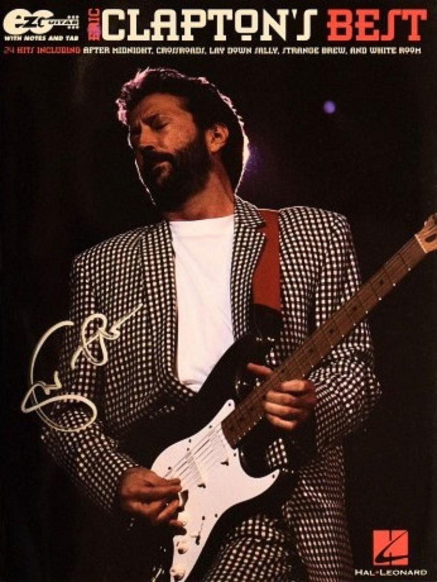 Eric Clapton signed music book | EstateSales.org