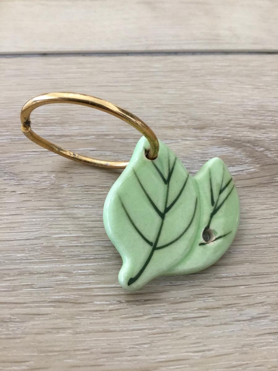Ceramic leaf keychain | EstateSales.org