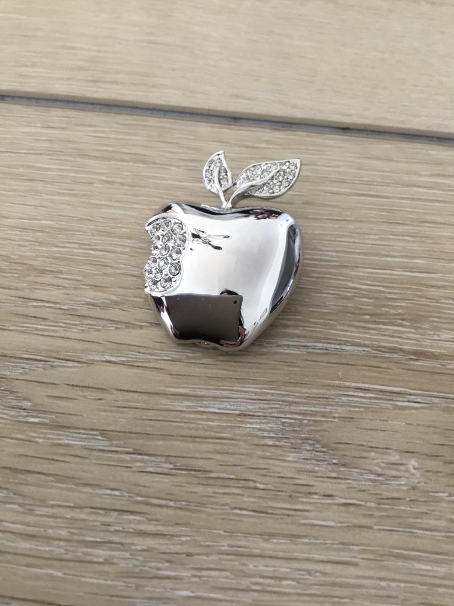 Silver tone apple pin | EstateSales.org