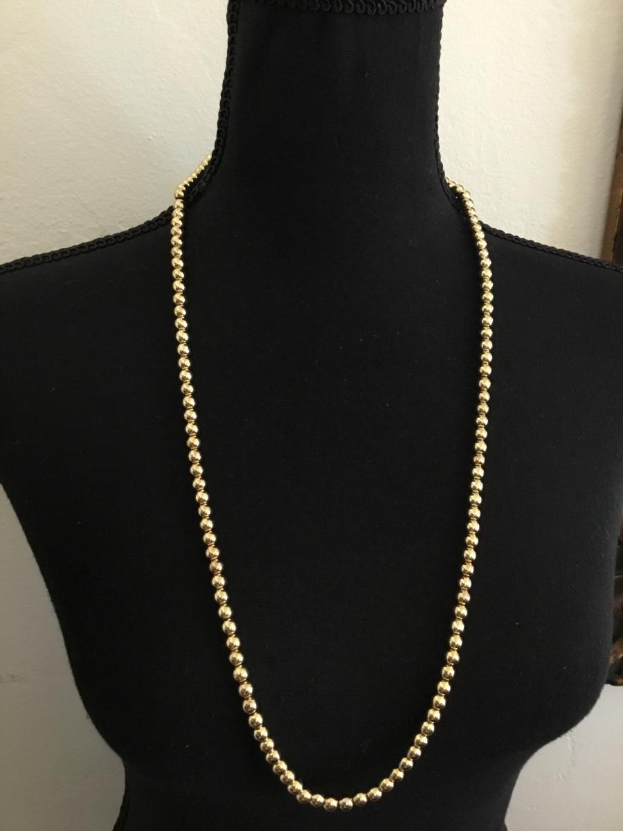 Vintage gold tone chain necklace with gold tone beads | EstateSales.org