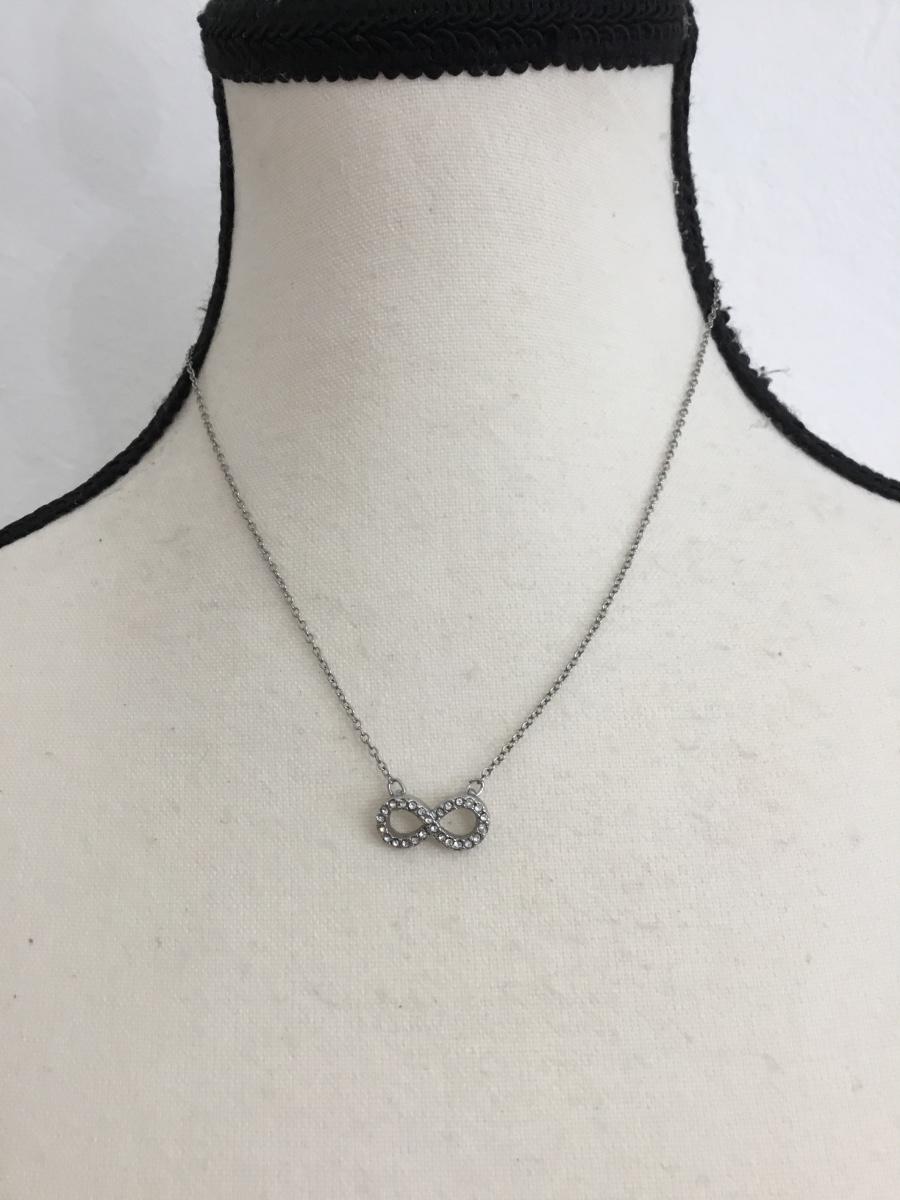 NY infinity necklace silver tone | EstateSales.org