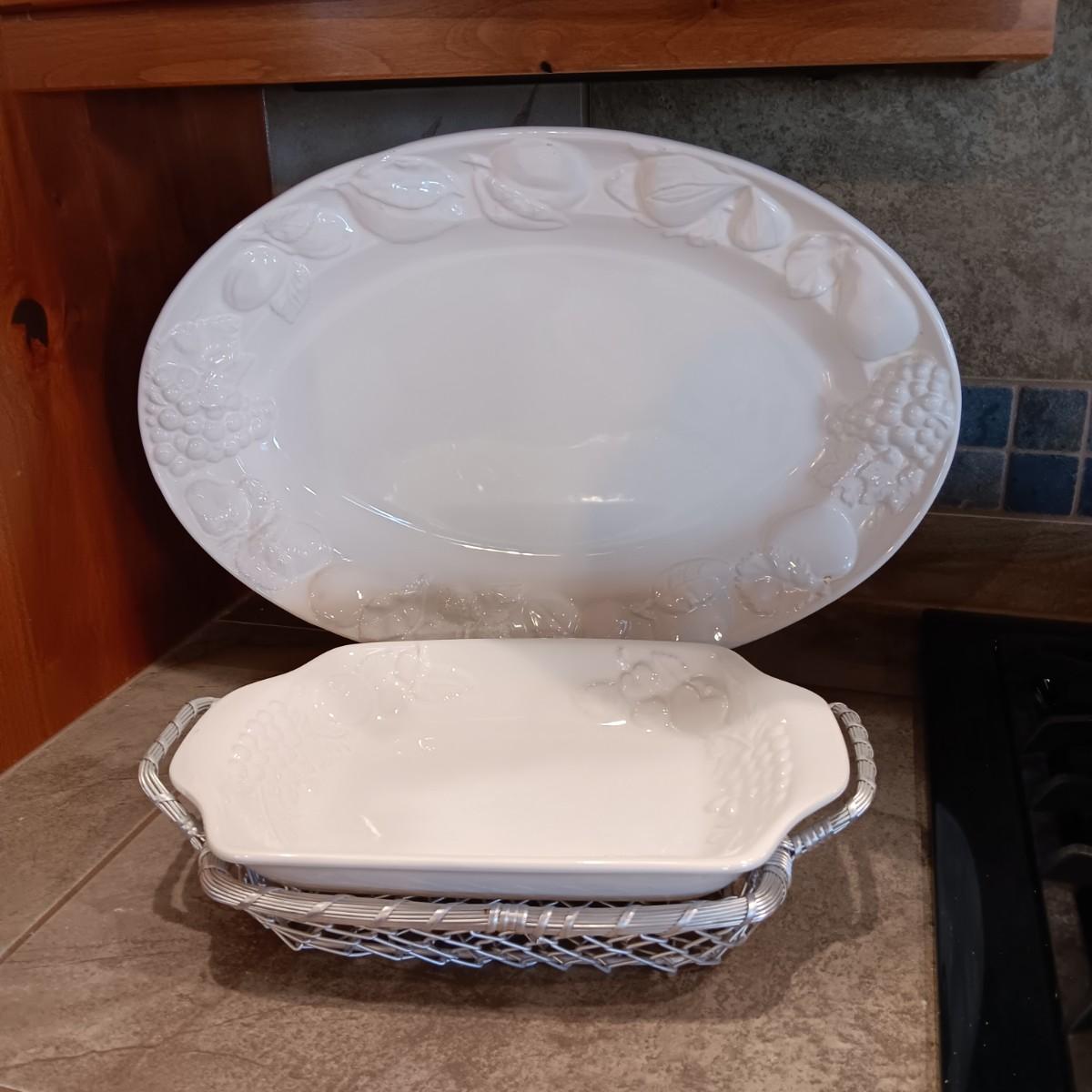 2 PLATTERS WITH RAISED FRUIT DECORATION | EstateSales.org