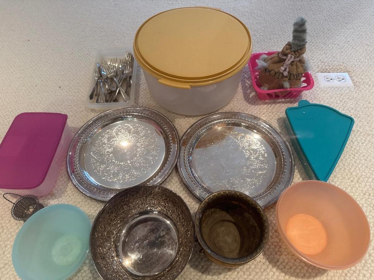 Tupperware and silver toned serving trays | EstateSales.org