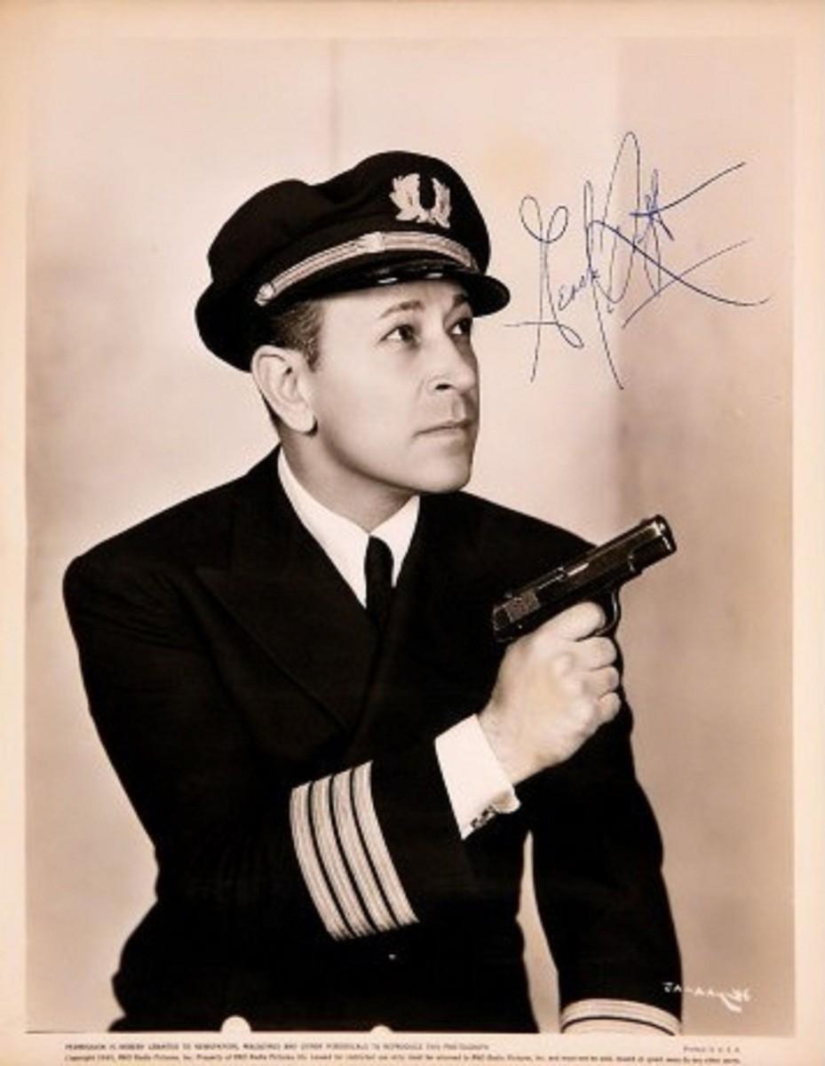 George Raft signed movie still photo | EstateSales.org