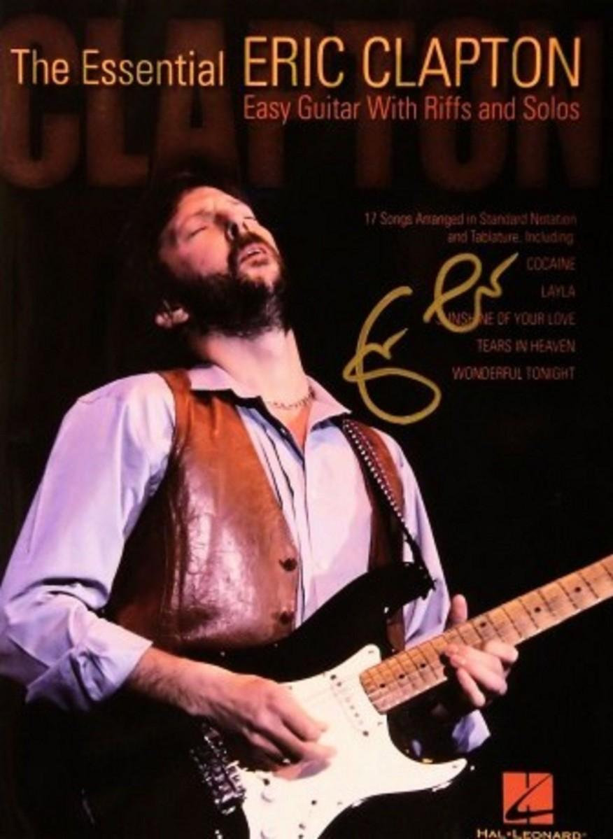 Eric Clapton signed music book | EstateSales.org