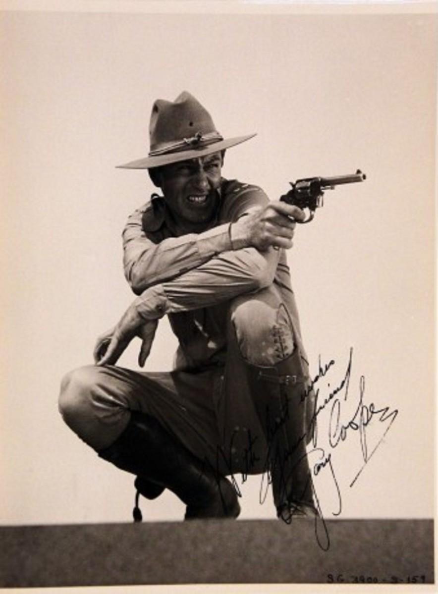 Gary Cooper signed movie still photo | EstateSales.org