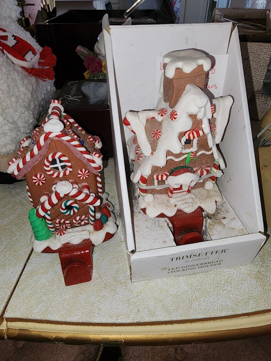Pair of gingerbread stocking holders. | EstateSales.org