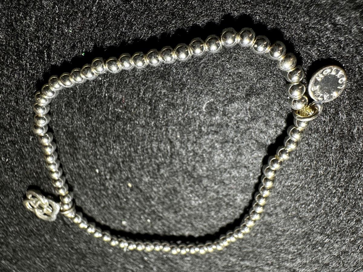 Vintage Katie loxton silver tone charm stretch bracelet | EstateSales.org