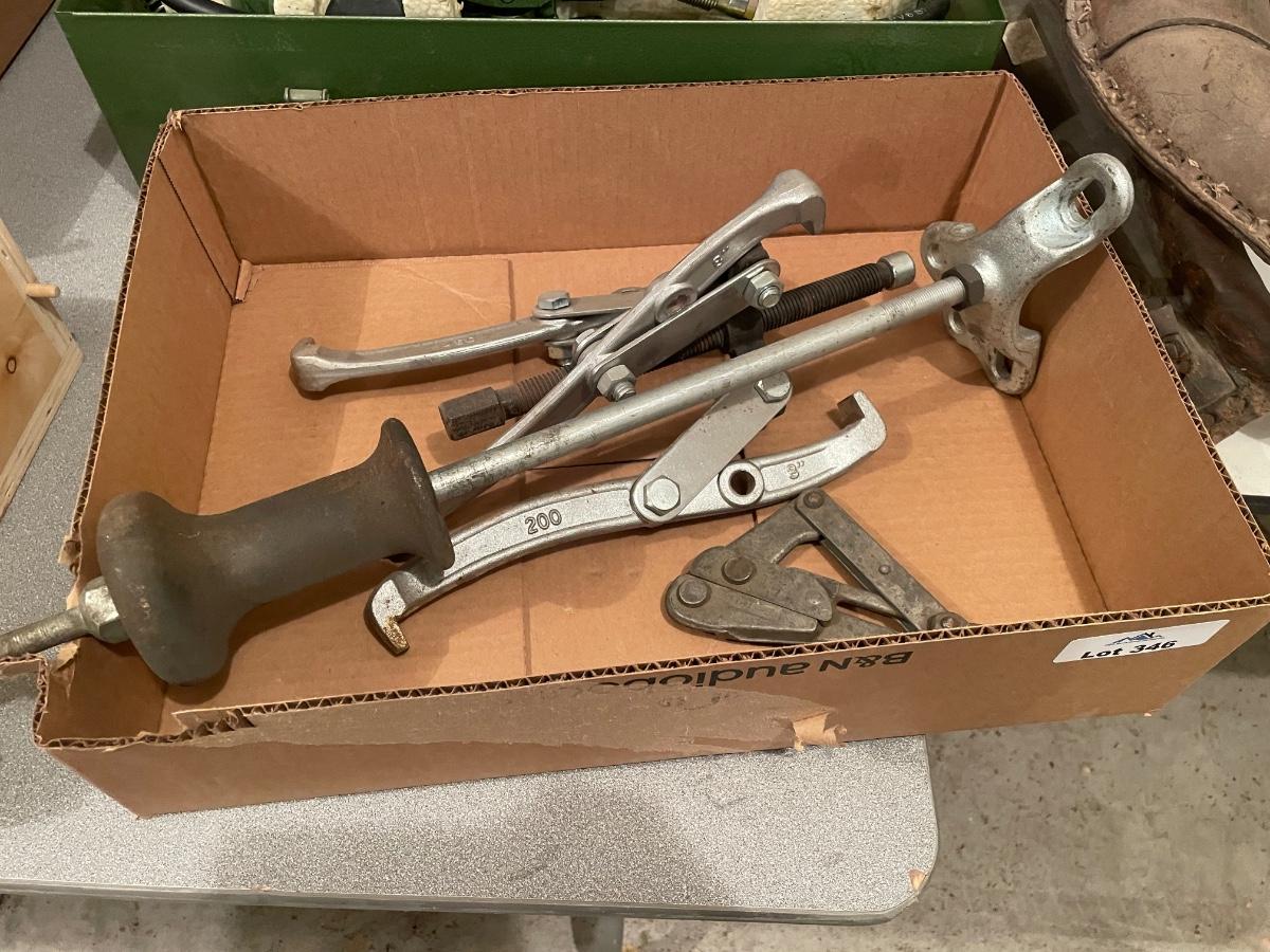 Box of metal industrial Dent Pullers | EstateSales.org