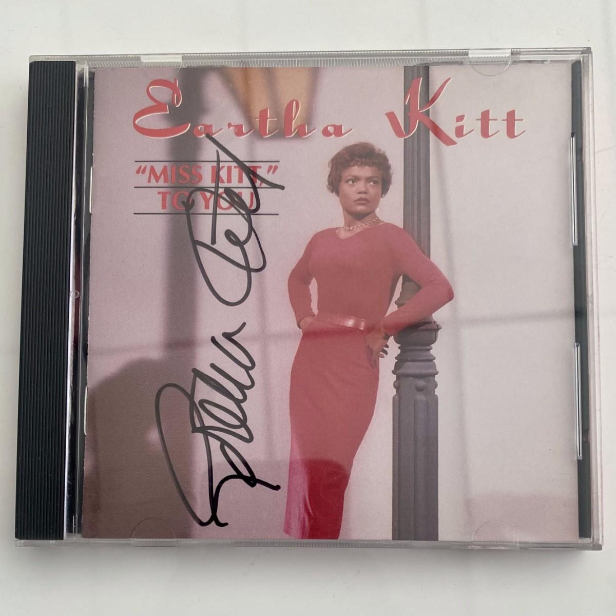 Eartha Kitt signed album | EstateSales.org