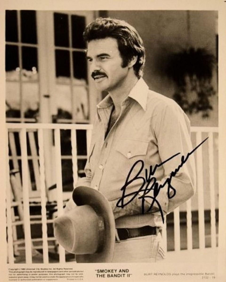 Burt Reynolds signed Smokey and The Bandit movie photo | EstateSales.org