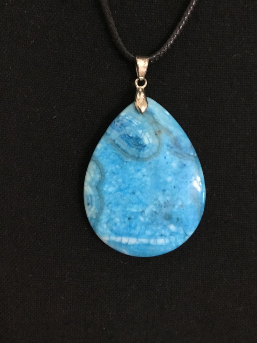 Beautiful large blue stone pendant & Black corded necklace ...