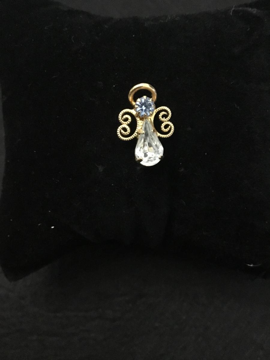 Vintage, gold tone, light blue, crystal angel pin | EstateSales.org