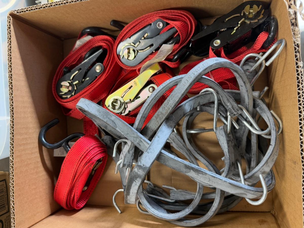Box with Ratchet & rubber tire chain straps | EstateSales.org