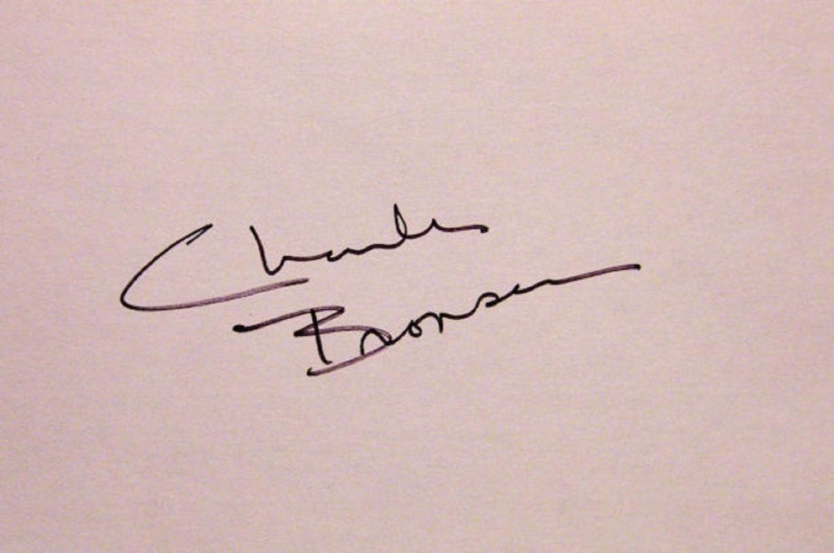 Charles Bronson signature slip | EstateSales.org