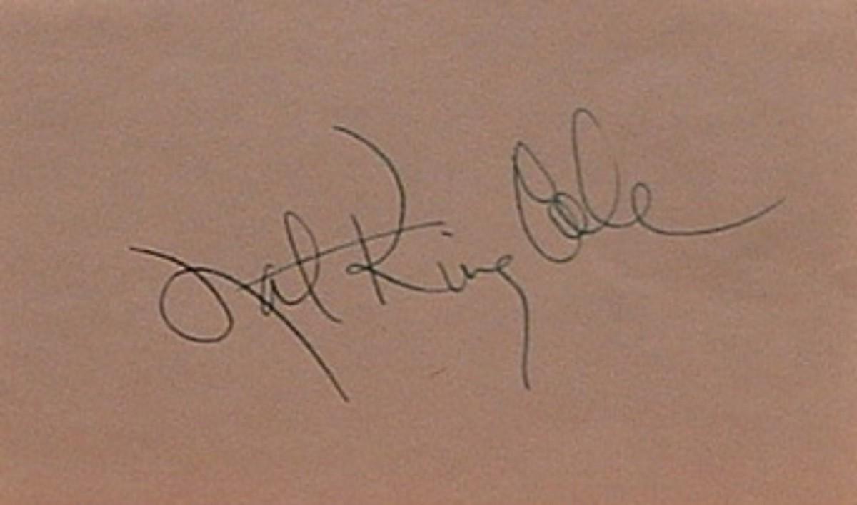 Nat King Cole signature slip | EstateSales.org