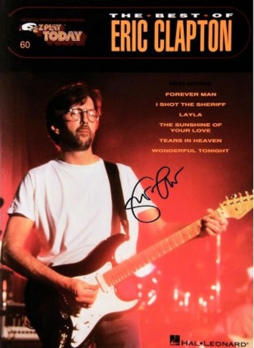 Eric Clapton signed music book | EstateSales.org