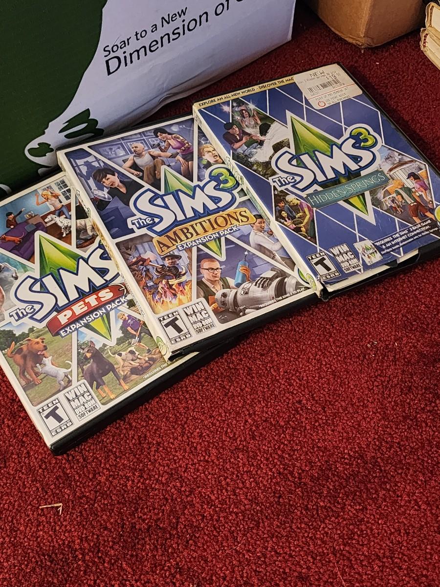Set of 3 SIMS computer games. | EstateSales.org
