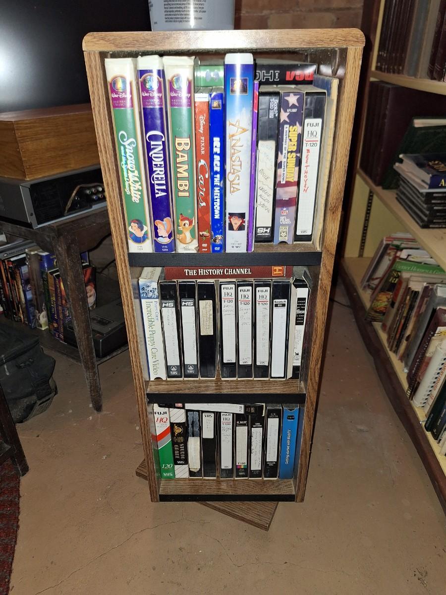 Rotating Movie Rack | EstateSales.org