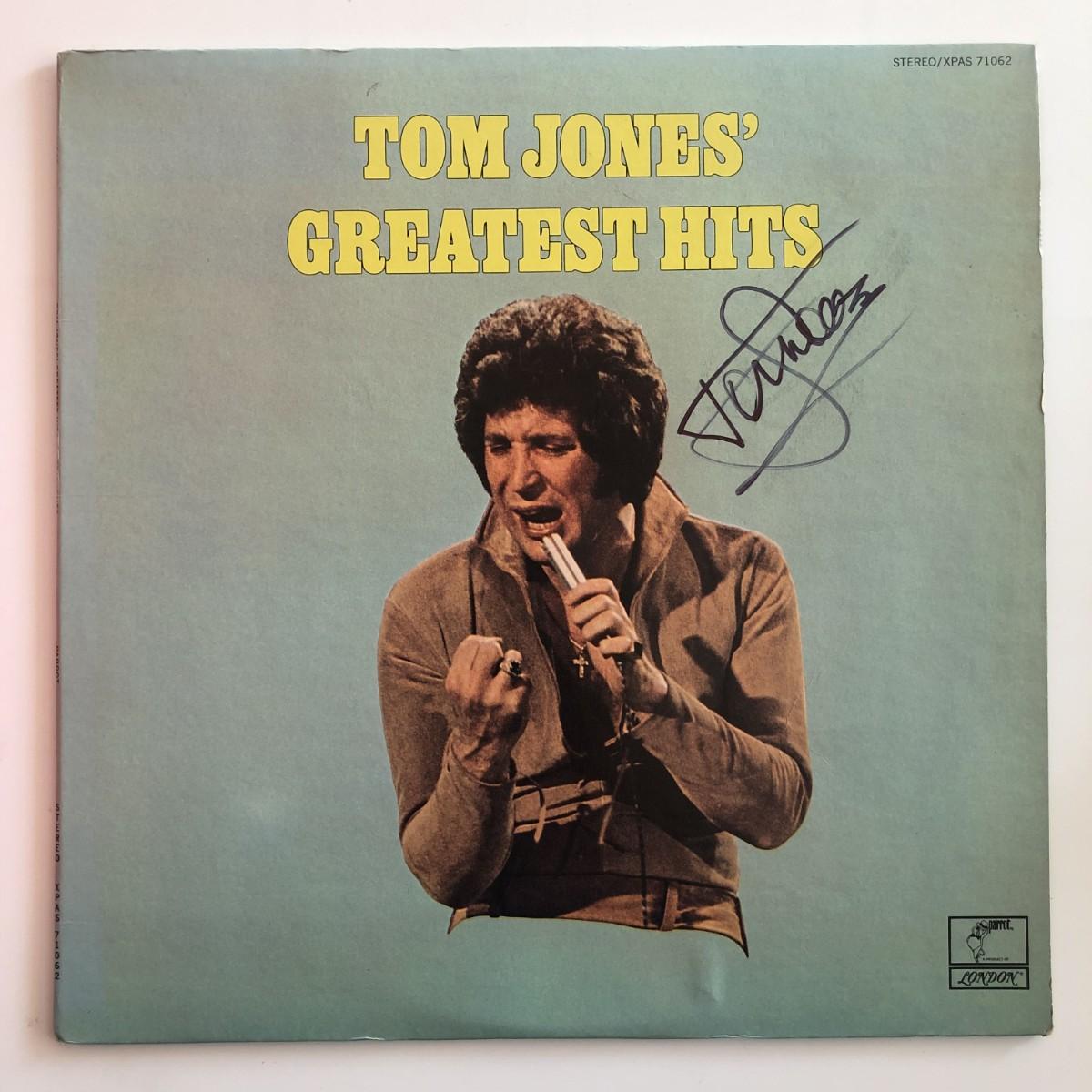 Tom Jones Greatest Hits signed album. GFA Authenticated | EstateSales.org