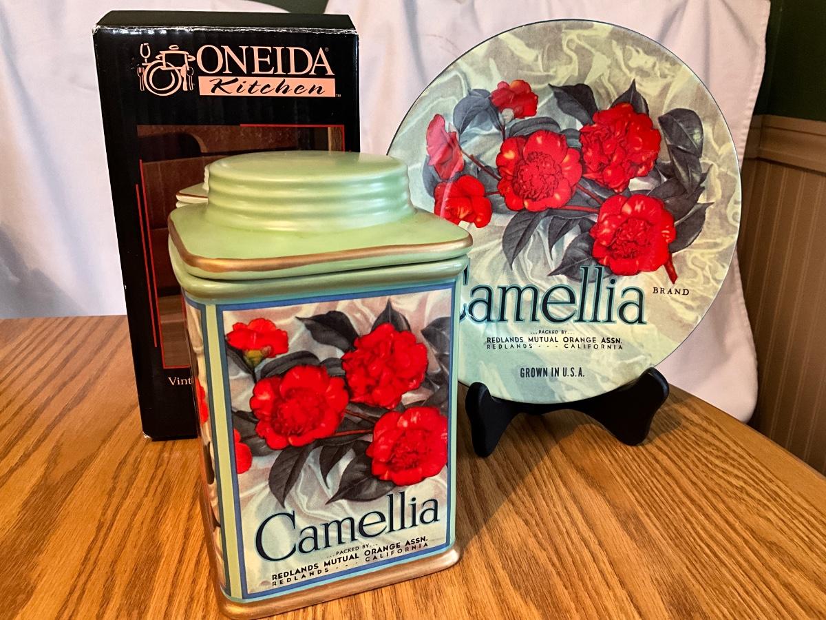 Oneida Camellia Ceramic Canister and Plate | EstateSales.org