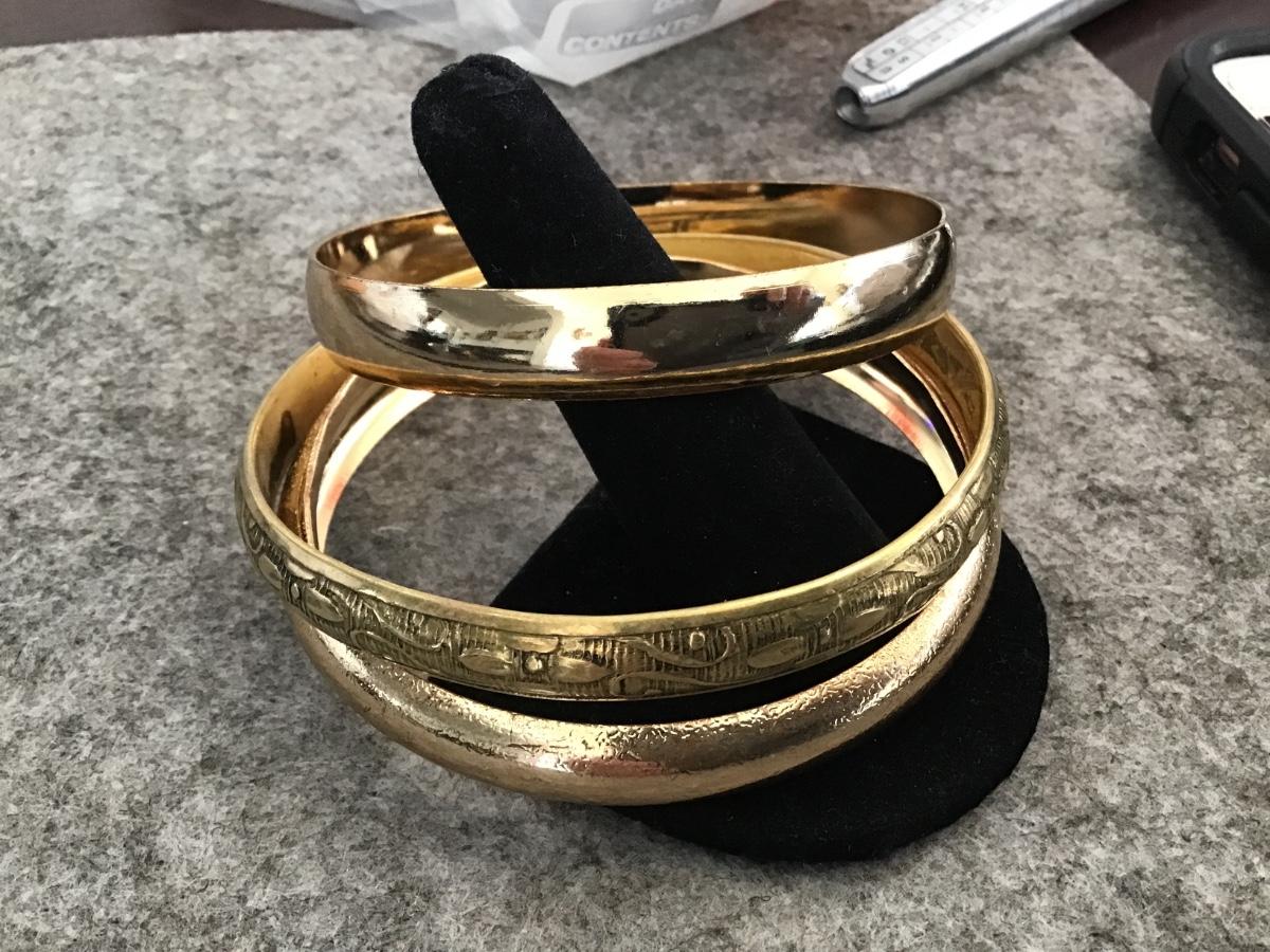 Lot Of Gold Tone Bangles | EstateSales.org