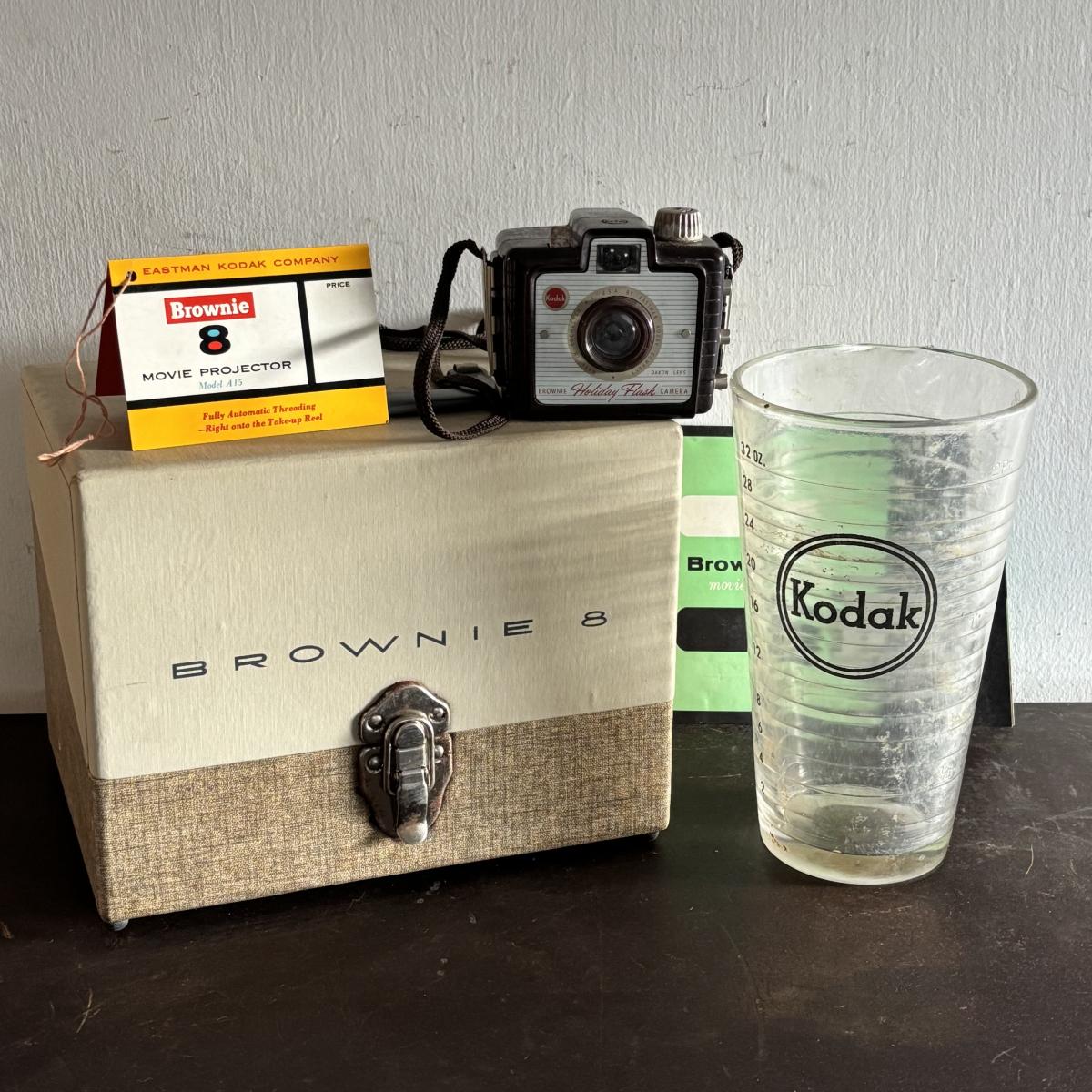 LOT 421: Vintage Eastman Kodal 32oz Darkroom Beaker, Kodak Brownie 8 Movie Projector, Brownie ...