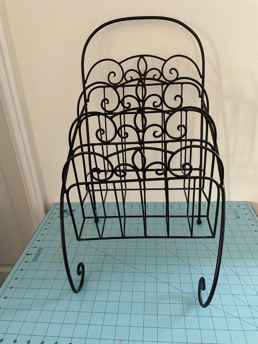 Metal magazine rack | EstateSales.org