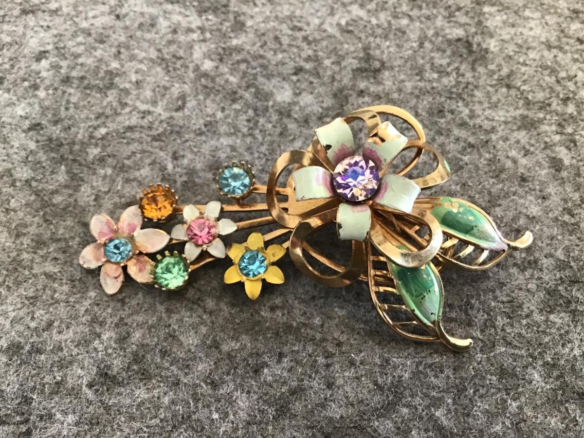 Vintage Enamel Rhinestone Spring Brooch | EstateSales.org