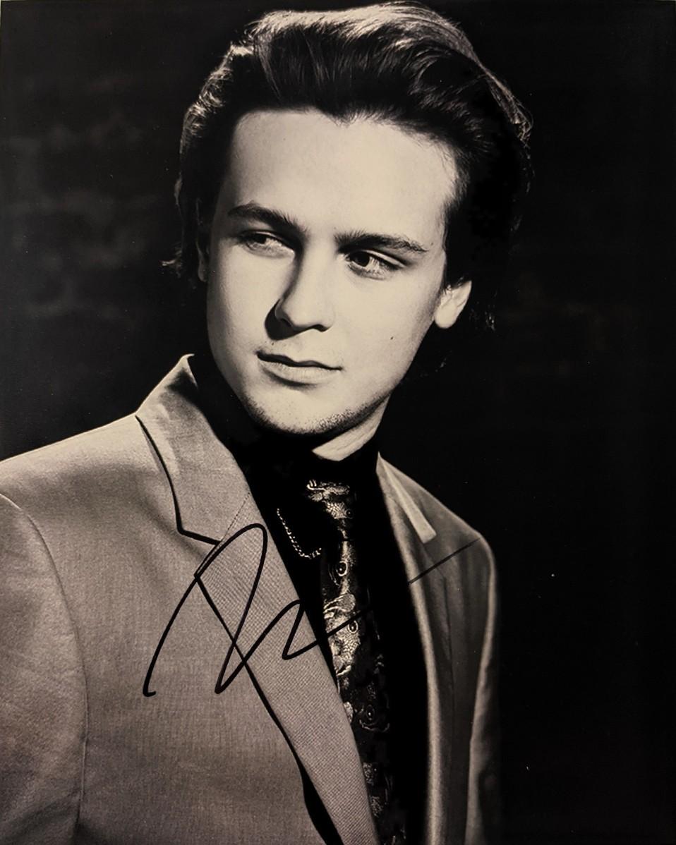 Logan Miller signed photo | EstateSales.org