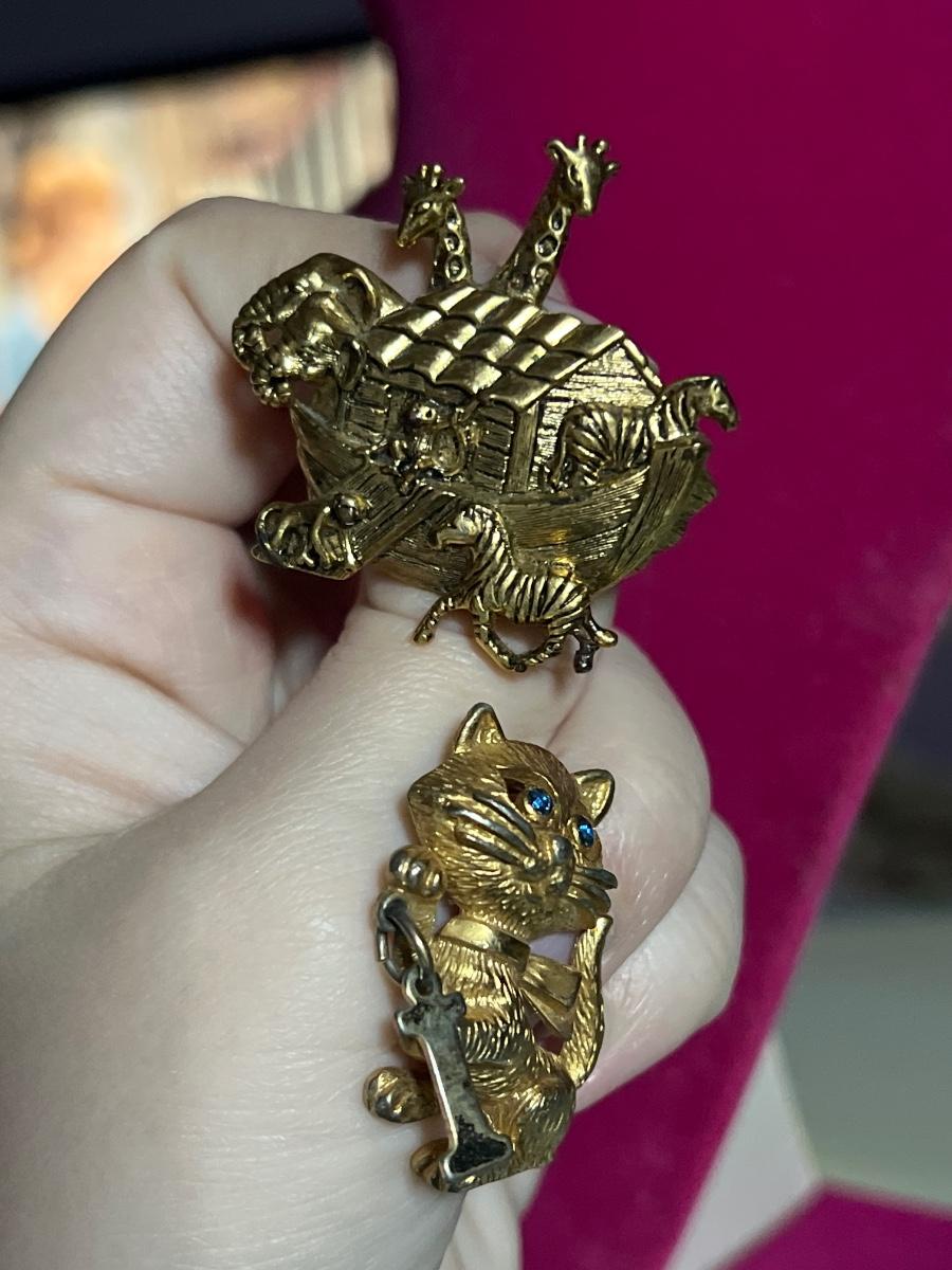 Golden toned pins | EstateSales.org